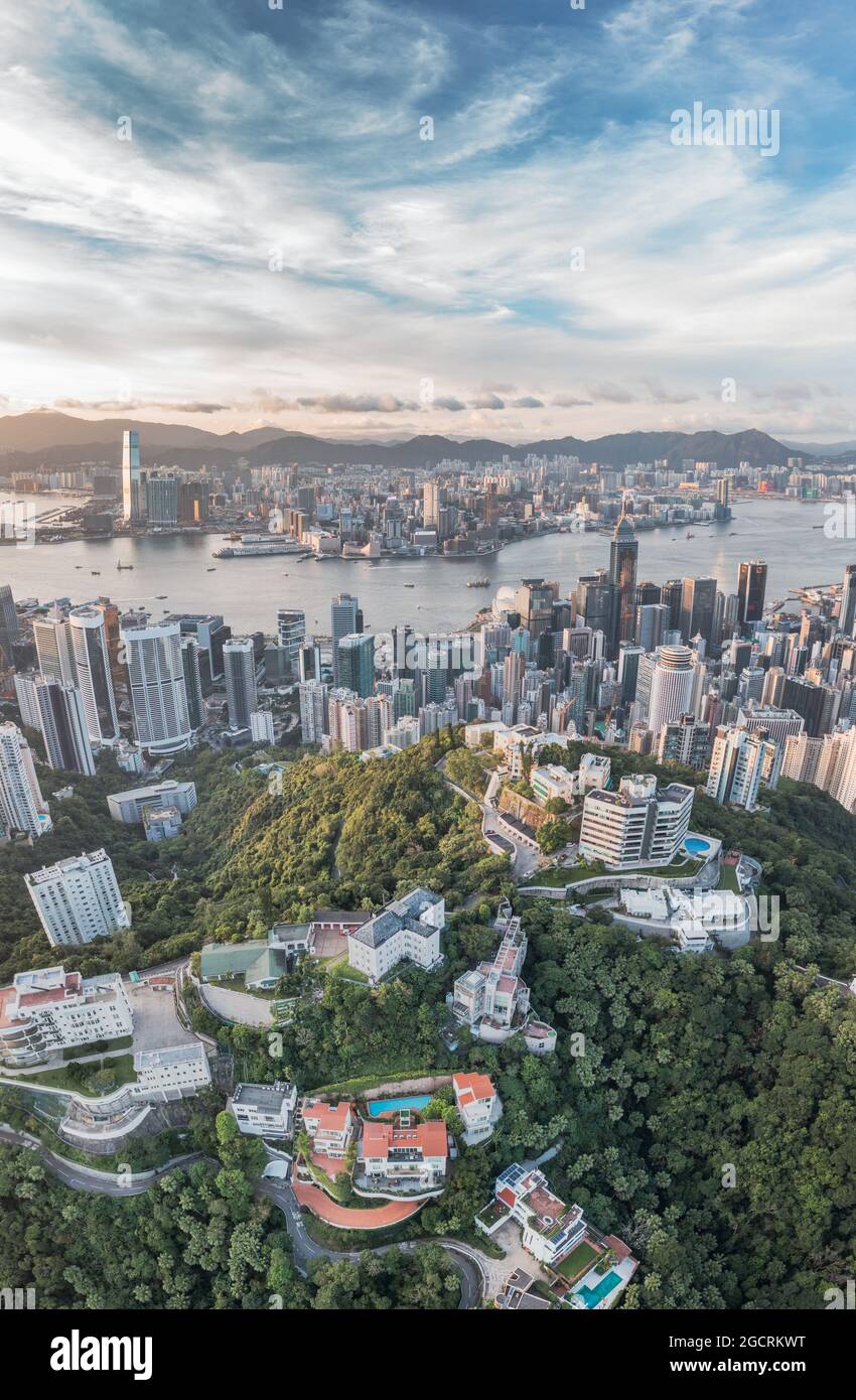 epic aerial view of the Victoria Harbour, Hong Kong, in a clear sky day ...