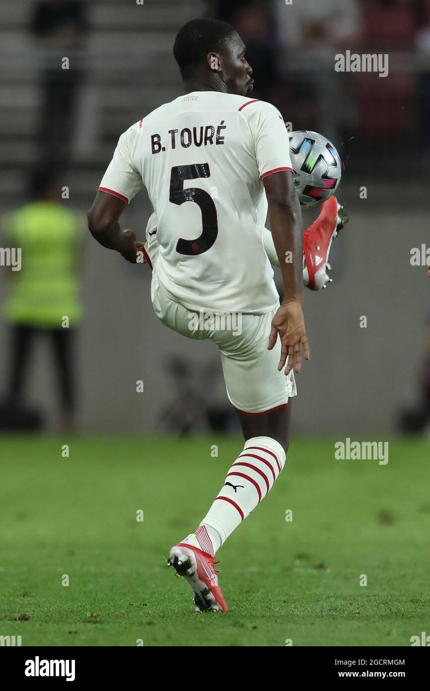 Klagenfurt, Austria, 8th August 2021. Fode Ballo-Toure of AC Milan controls the ball during the ...