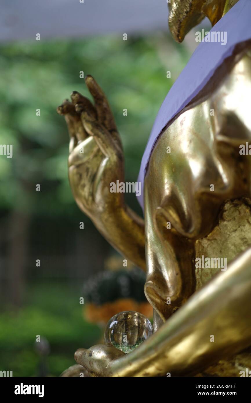 Buddha holding a ball hi-res stock photography and images - Alamy