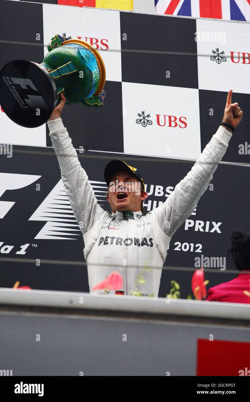 Race winner Nico Rosberg (GER) Mercedes AMG F1 celebrates on the podium ...