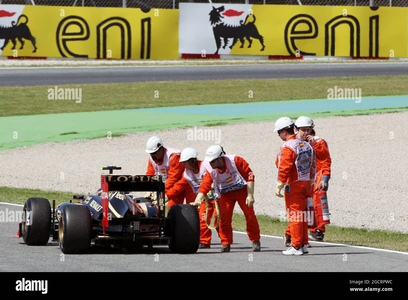 Romain Grosjean (FRA) Lotus F1 E20 stops on track in the third practice ...