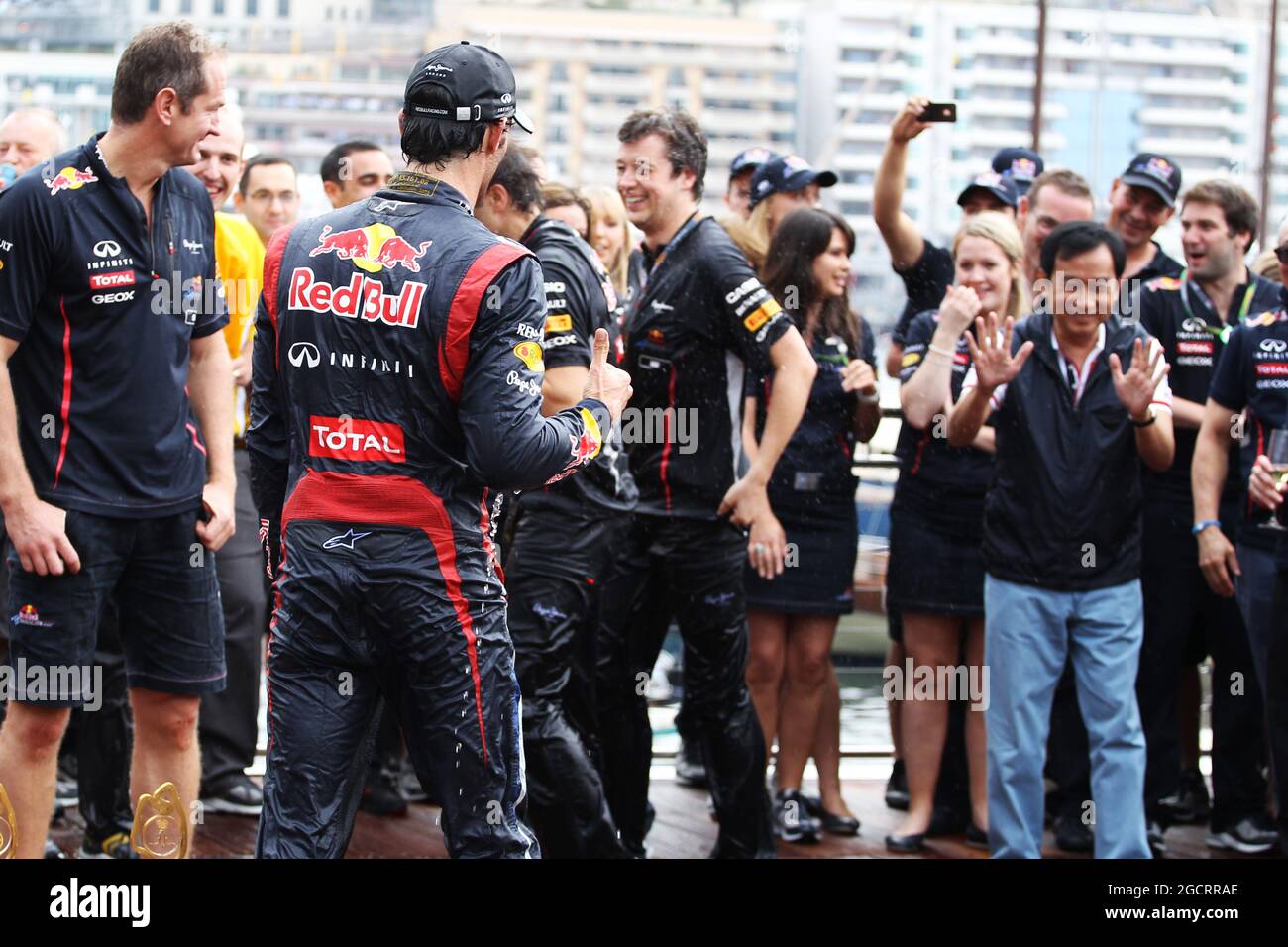 Race winner Mark Webber (AUS) Red Bull Racing celebrates with the team ...