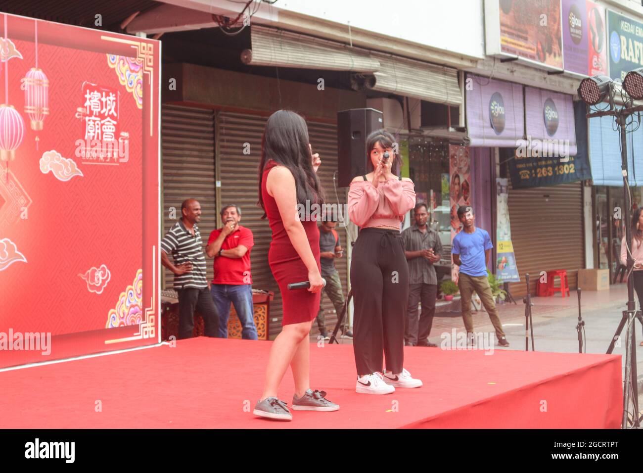 GEORGETOWN, MALAYSIA - Feb 02, 2020: The hosts presenting traditional ...
