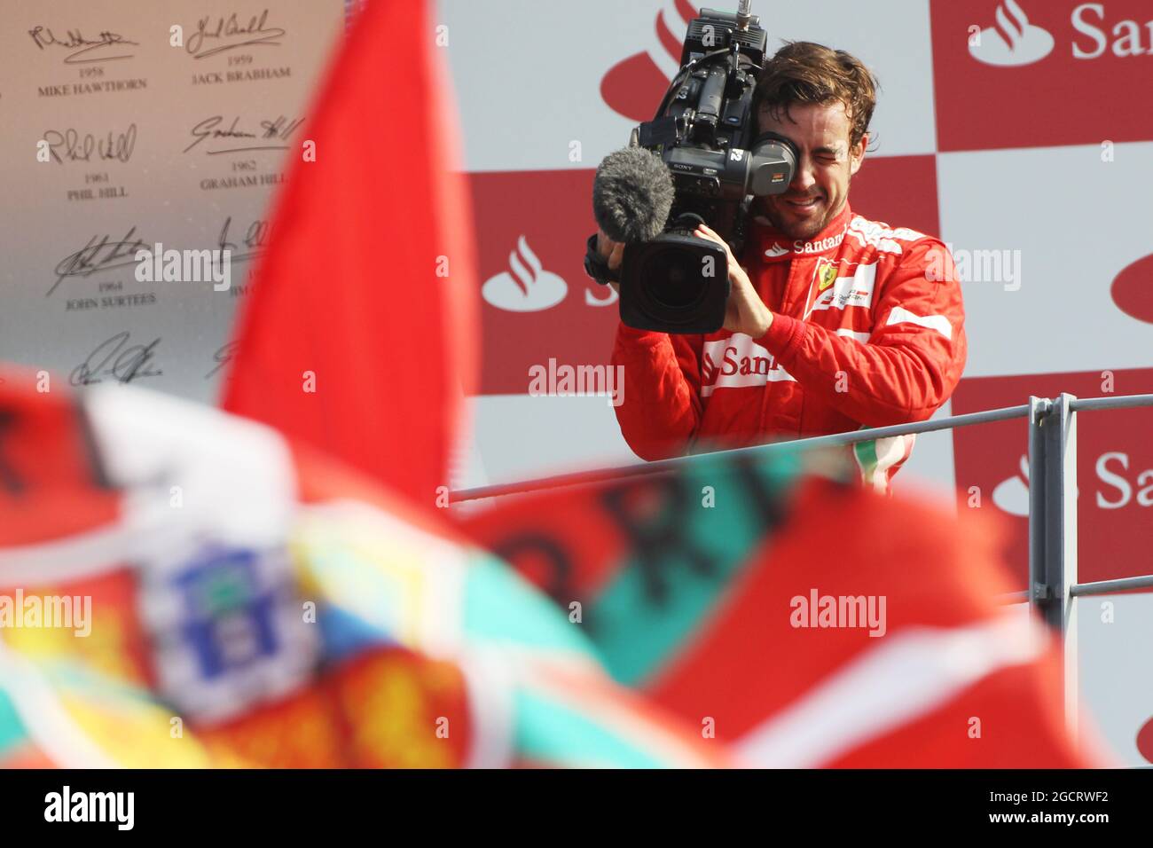 Ferrari takes control of a fom camera on podium hi-res stock ...