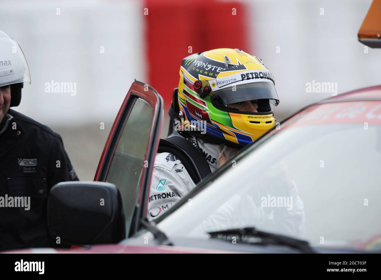 Lewis Hamilton (GBR) Mercedes AMG F1 gets a lift back to the pits after ...