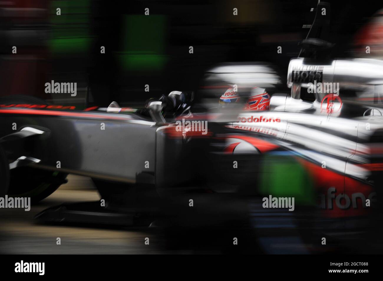 Mclaren mp4 28 in pits hi-res stock photography and images - Alamy