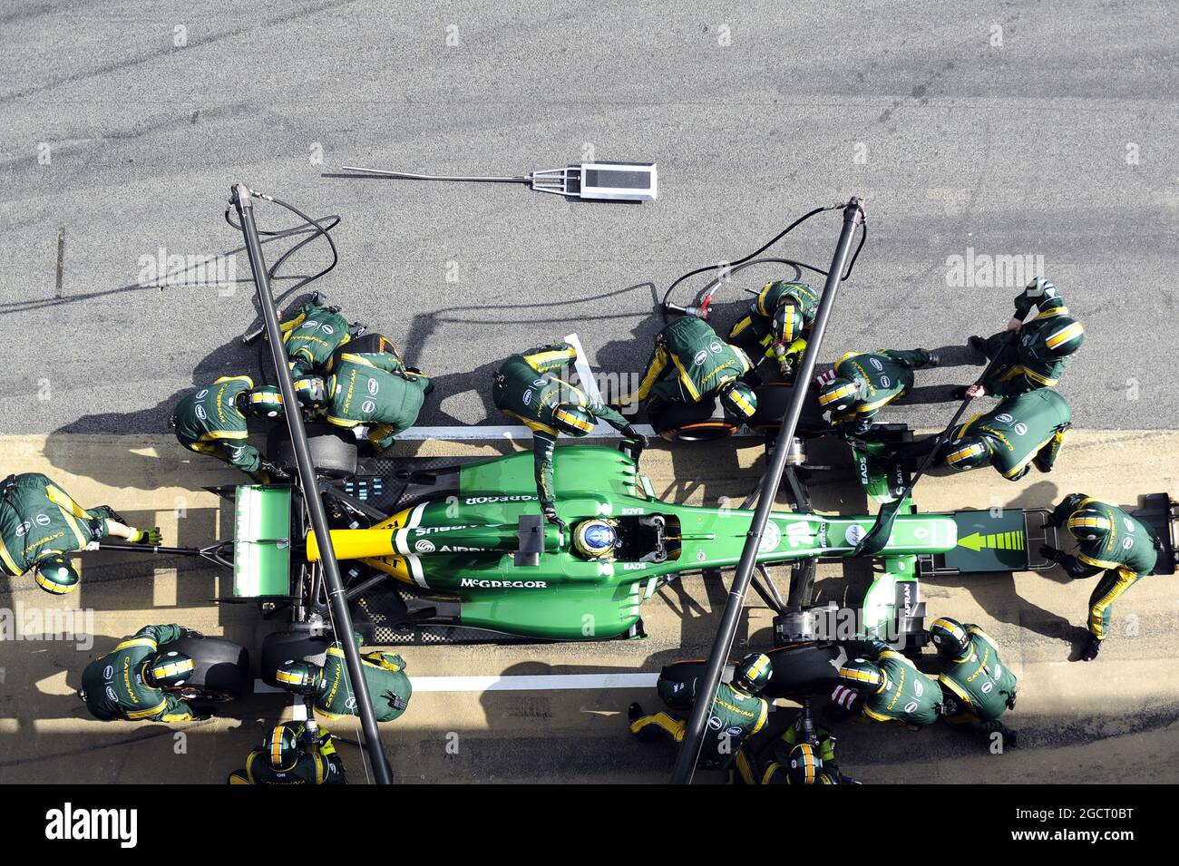 Caterham ct03 practices a pit stop hi-res stock photography and images ...
