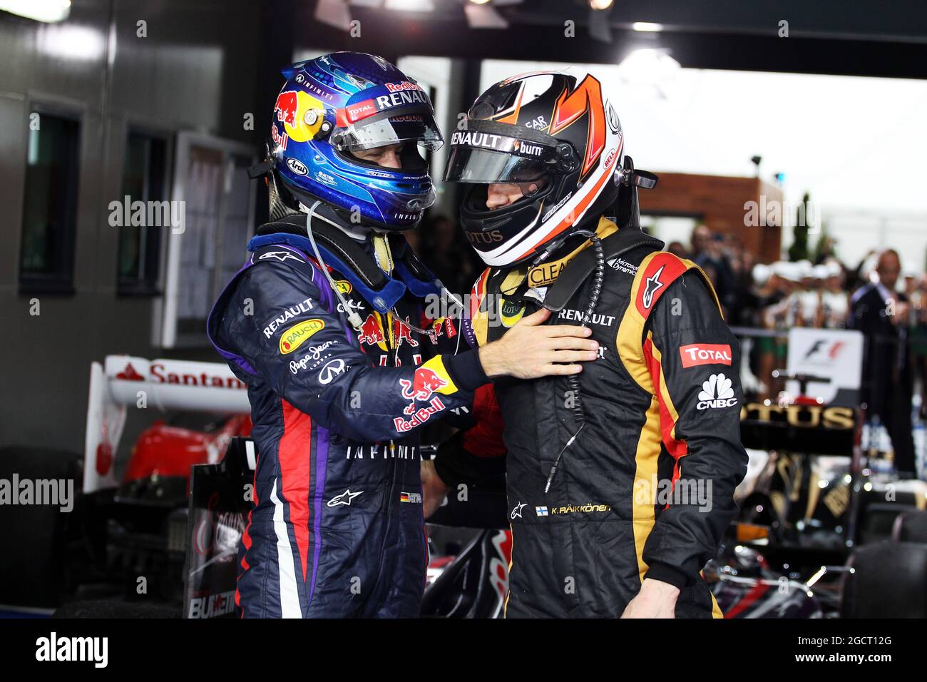 Race winner Kimi Raikkonen (FIN) Lotus F1 Team celebrates with ...