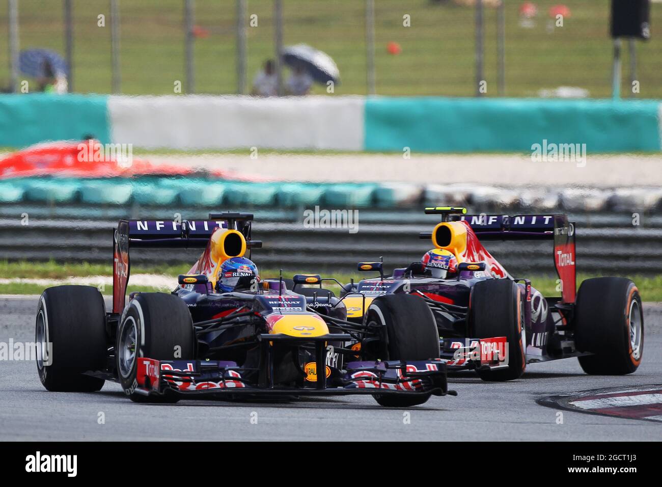 Sebastian Vettel (GER) Red Bull Racing RB9 leads team mate Mark Webber ...