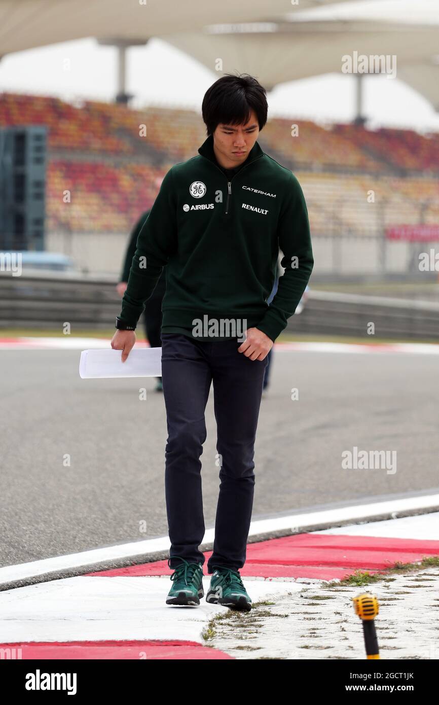 Ma qing hua chn caterham f1 reserve driver walks circuit hi-res stock ...