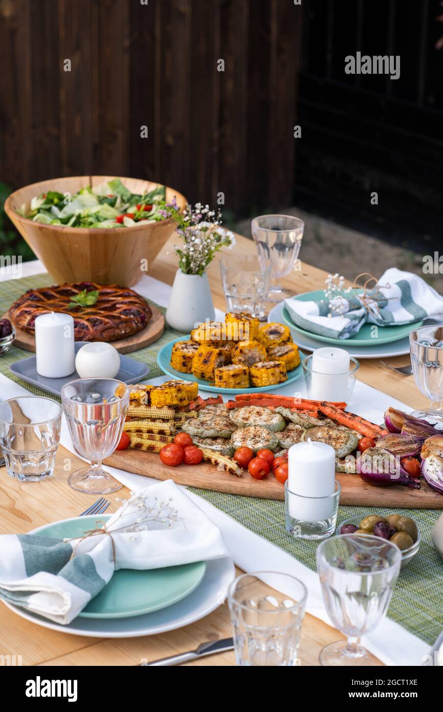 Variety of homemade vegetarian food on served table prepared for lunch ...