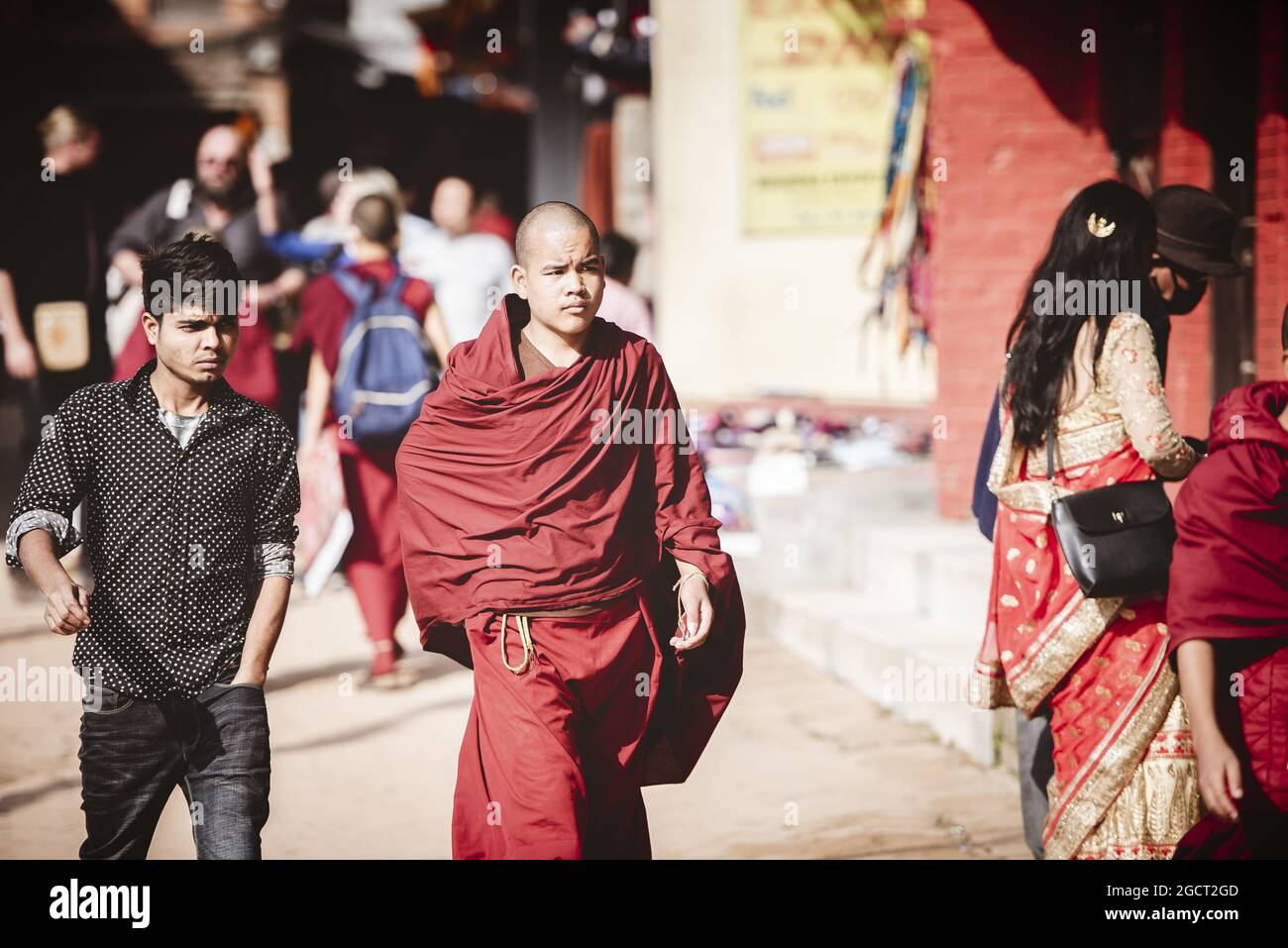 KATHMANDU, NEPAL - Jun 01, 2019: A group of worshippers of Buddhism in ...