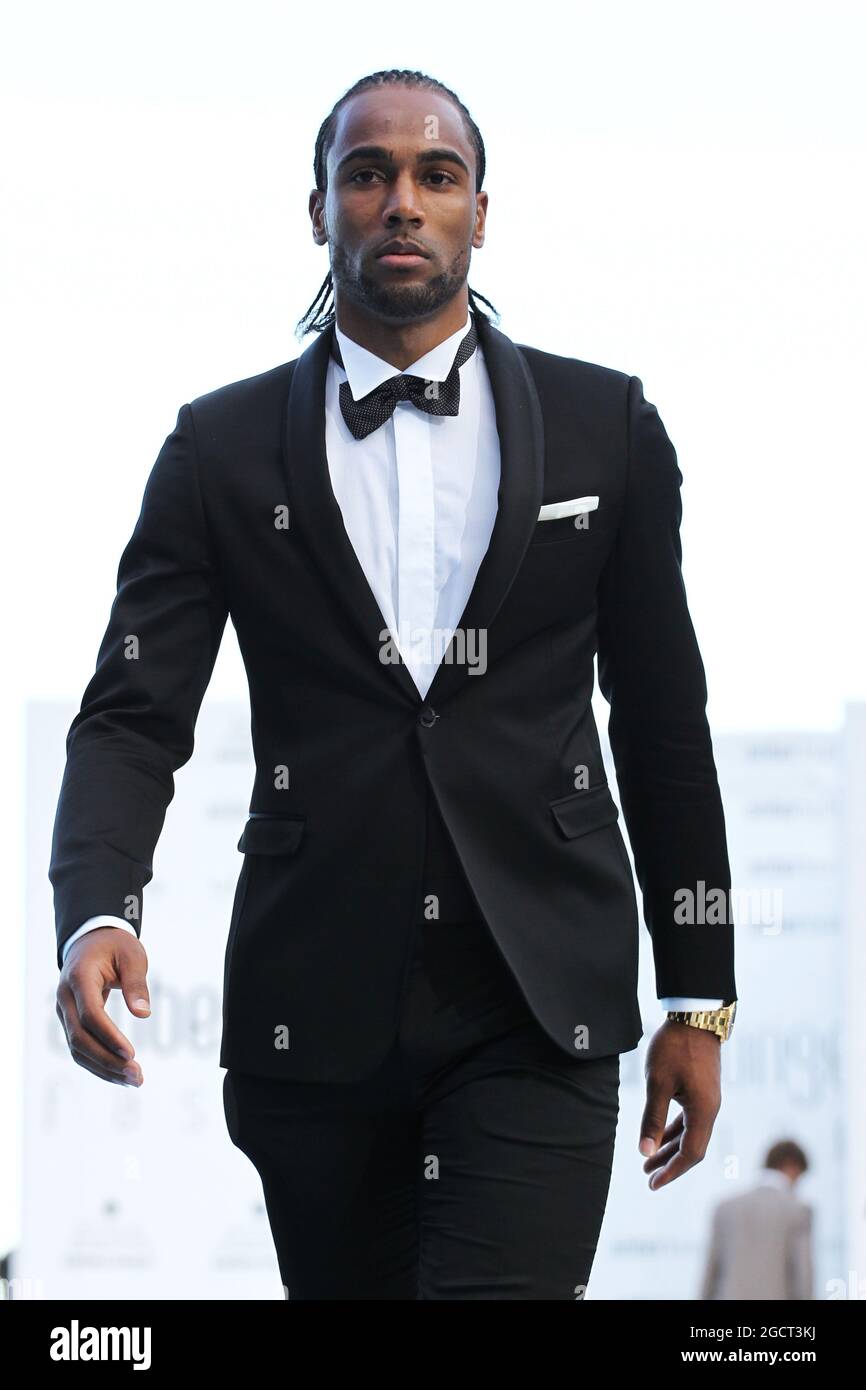 Football player at amber lounge fashion show hi-res stock photography ...