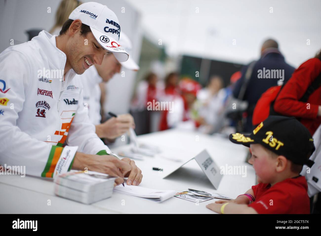 Adrian Sutil (GER) Sahara Force India F1 signs autographs for the fans ...