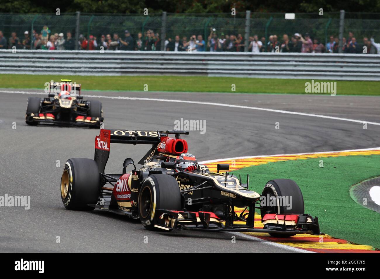 Kimi Raikkonen (FIN) Lotus F1 E21 leads team mate Romain Grosjean (FRA ...