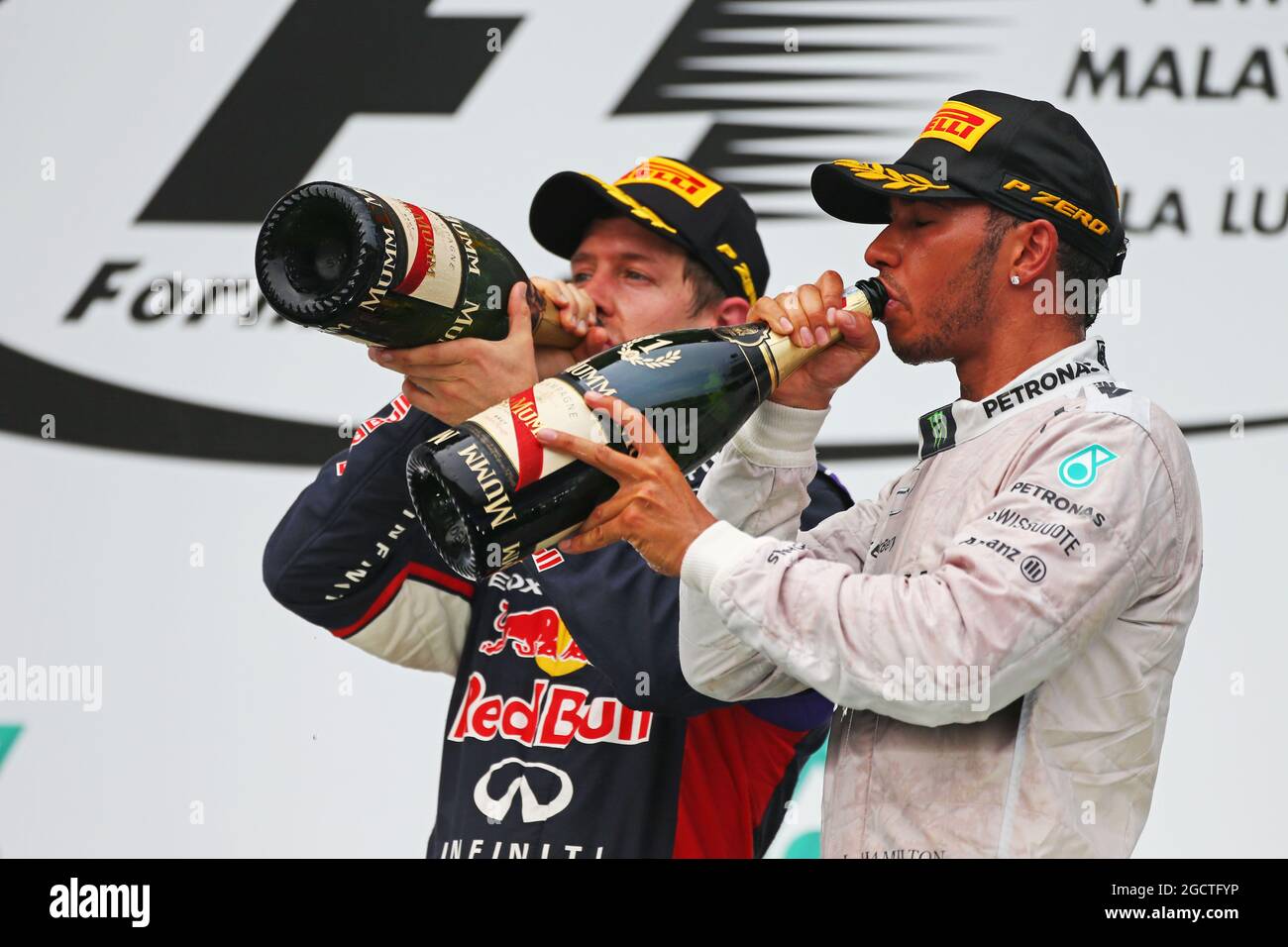 Red bull racing celebrates his third position champagne on podium hi ...