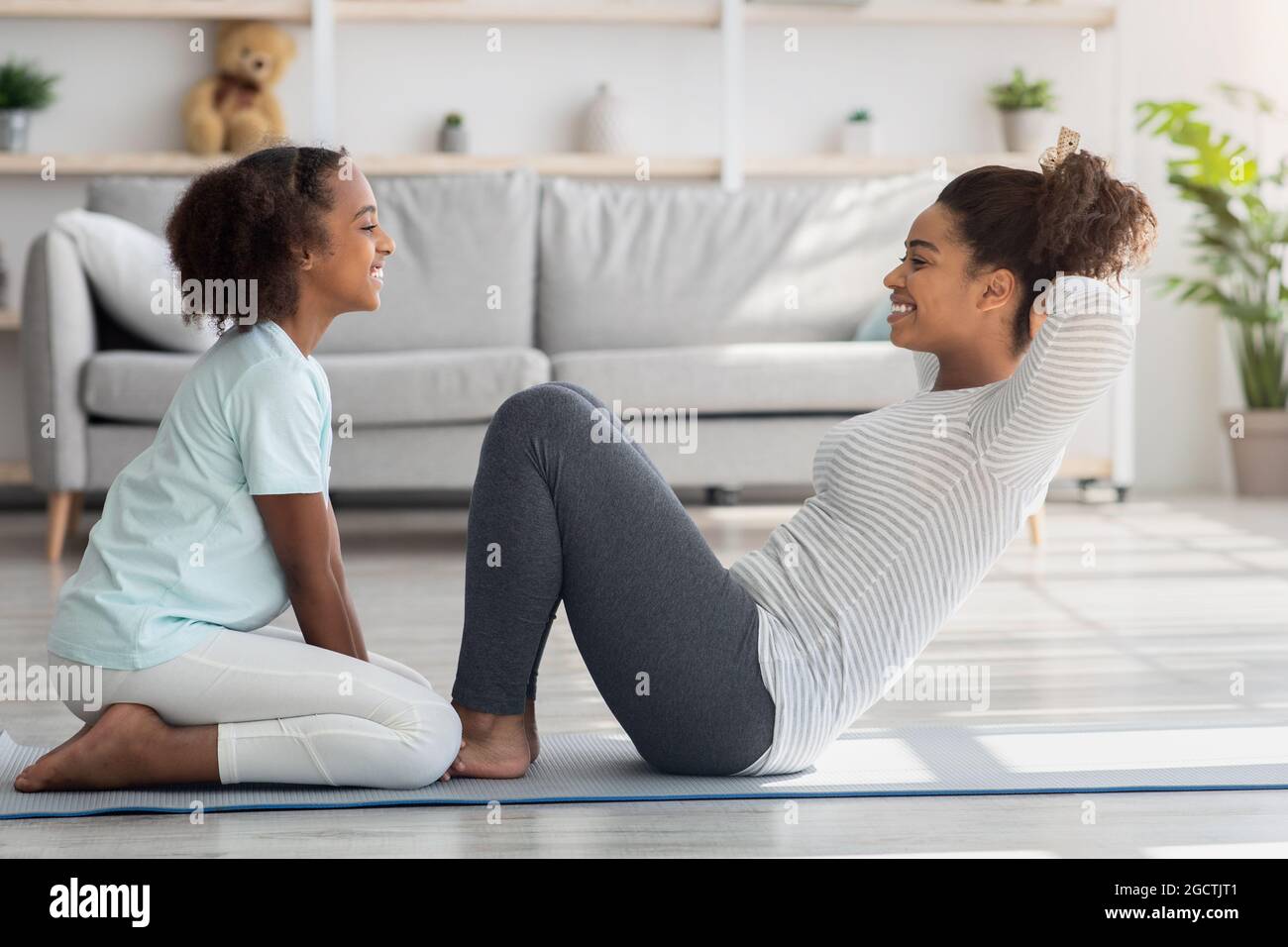 Girl training mom hi-res stock photography and images - Alamy