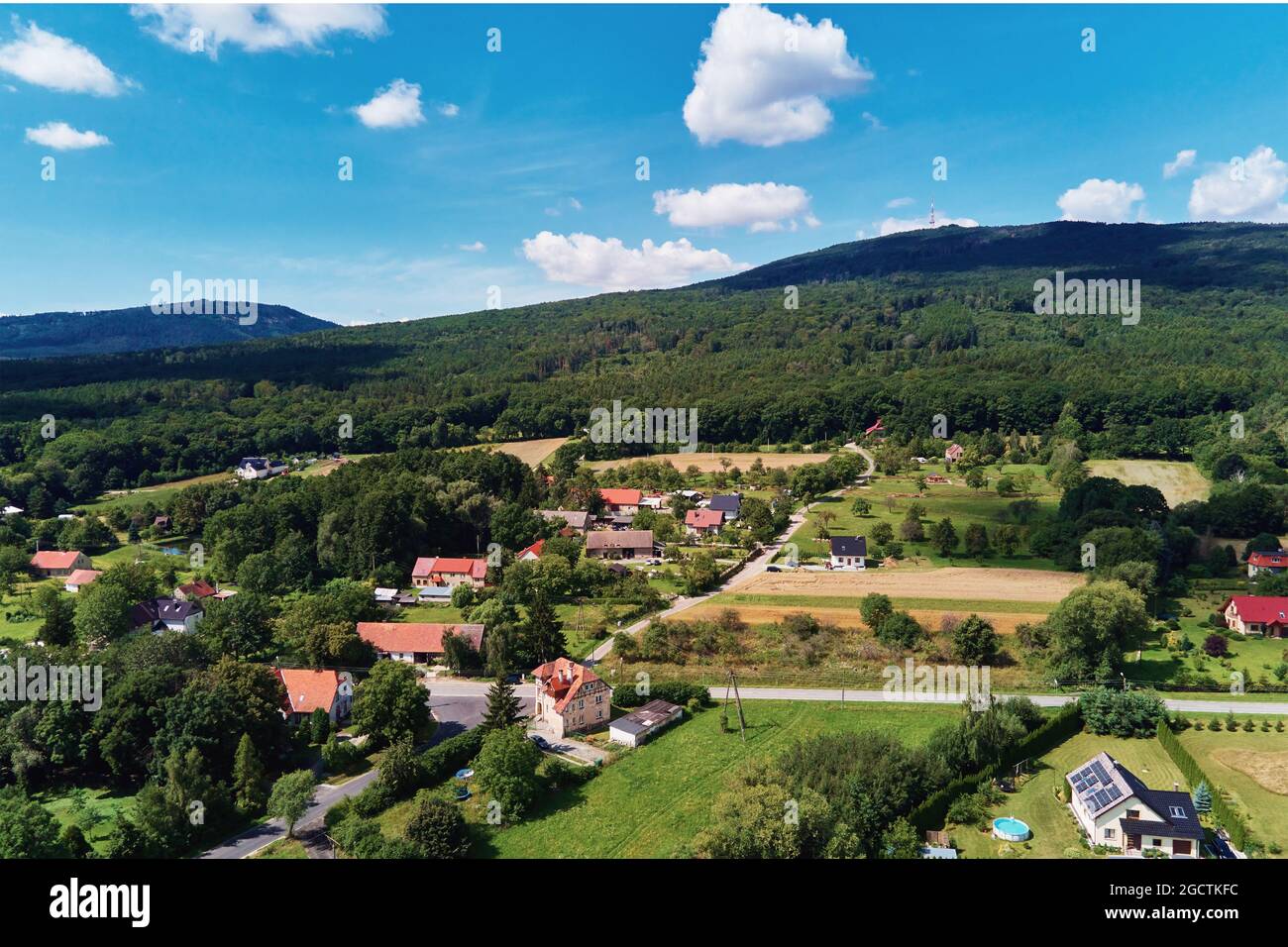 Mountain village with forests, bird eye view. Sleza mountain landscape ...
