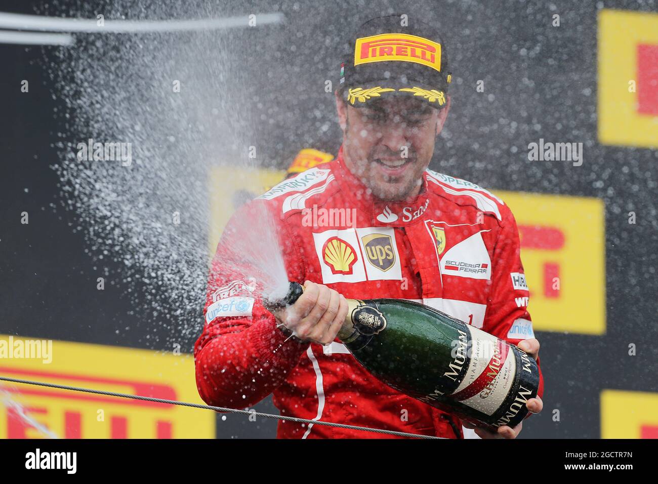 Ferrari celebrates his second position champagne on podium hi-res stock ...