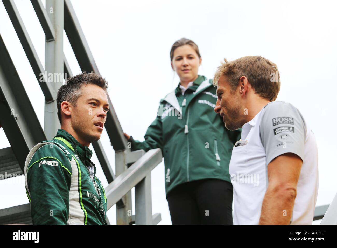 (L to R): Andre Lotterer (GER) Caterham F1 Team with Jenson Button (GBR ...