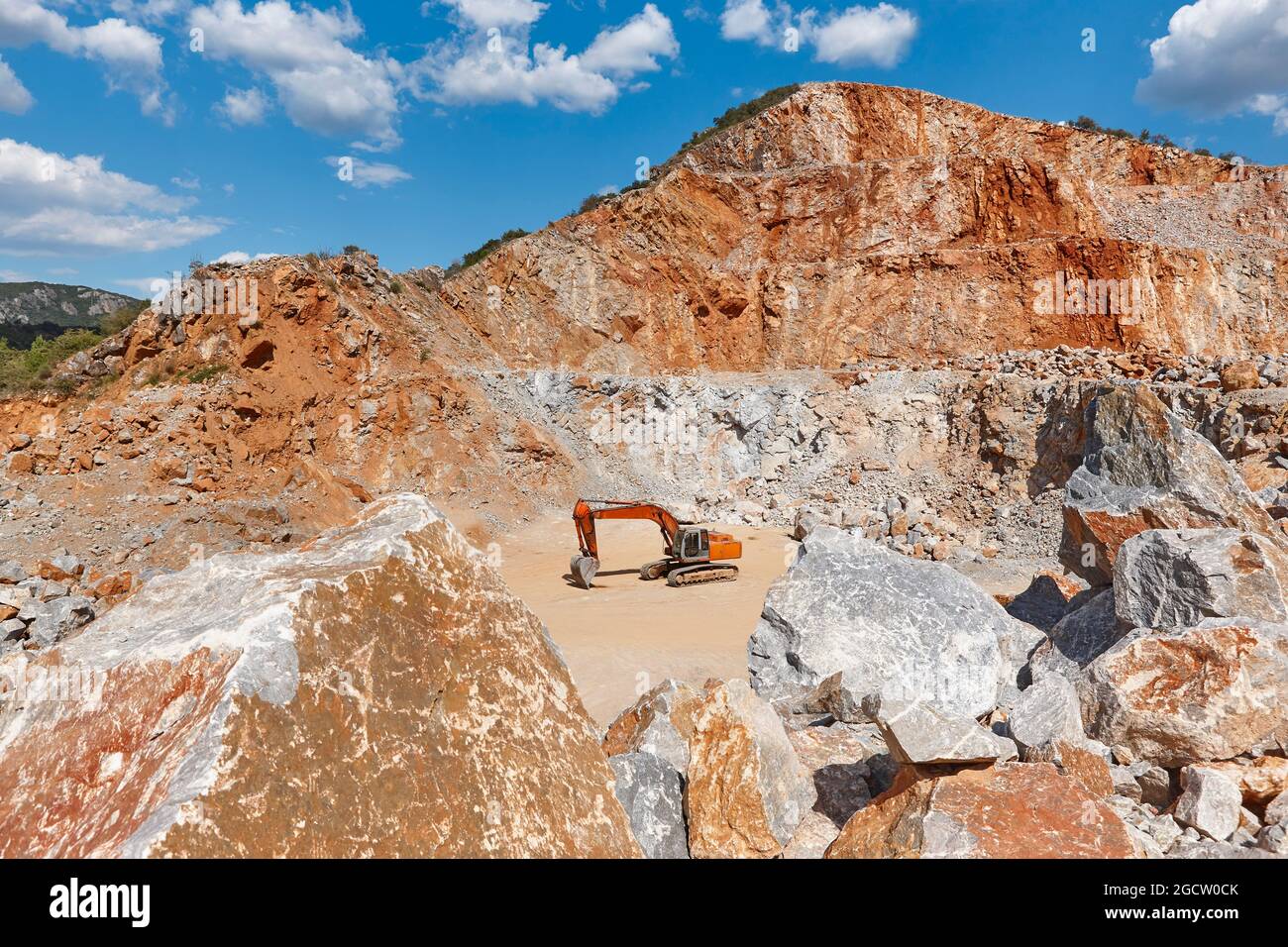 Heavy excavator on a quarry. Excavation machinery. Earthmover Stock ...