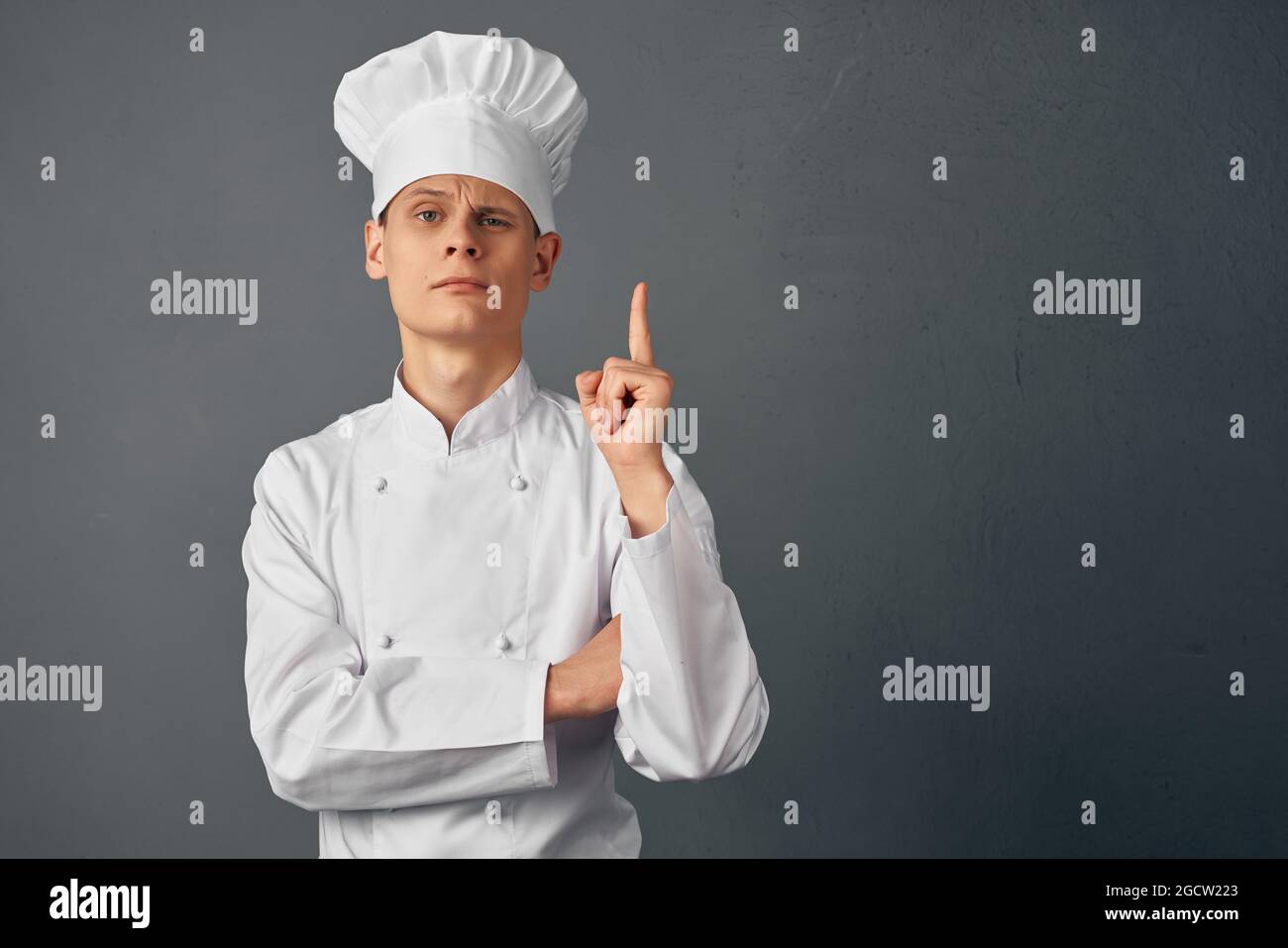 emotional chef gestures with his hand to a professional foodie Stock ...