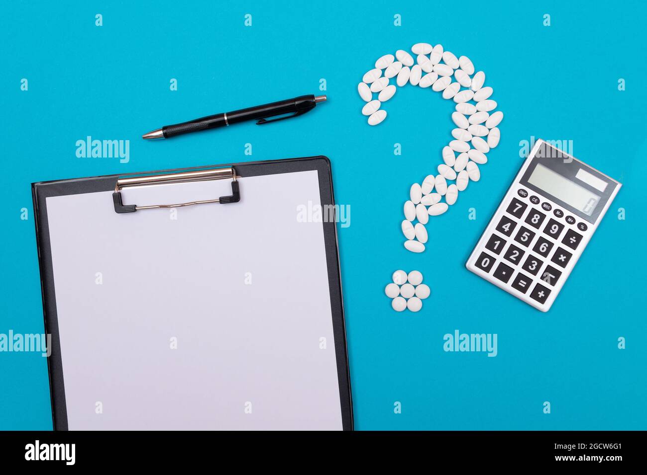 Treatment Costs and Budget. Question Mark Made from White Pills and ...