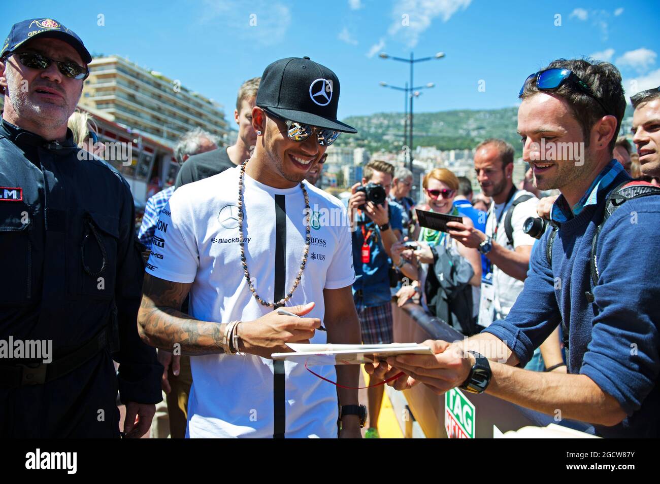 Lewis Hamilton (GBR) Mercedes AMG F1 signs autographs for the fans ...