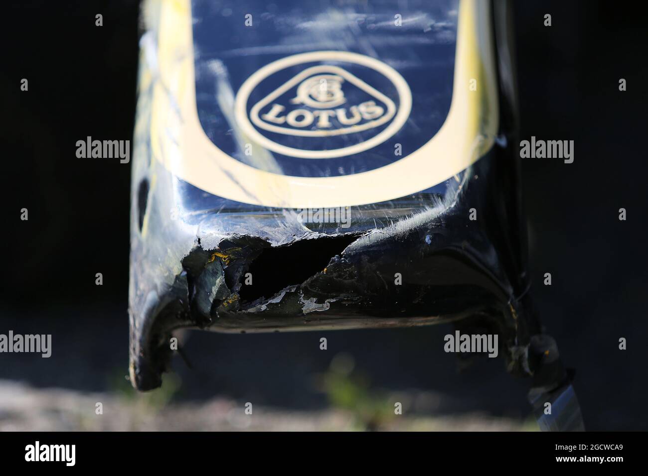 The damaged Lotus F1 E23 of Pastor Maldonado (VEN) Lotus F1 Team, who ...