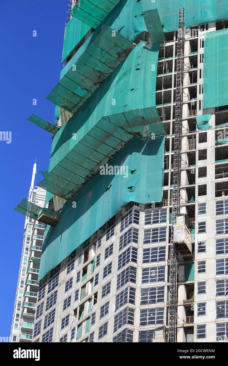 Office building construction - generic city skyscraper development in ...