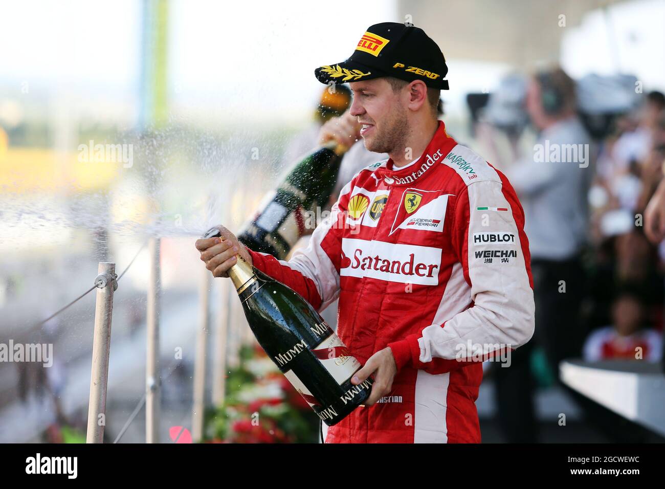 Ferrari celebrates his third position champagne on podium hi-res stock ...