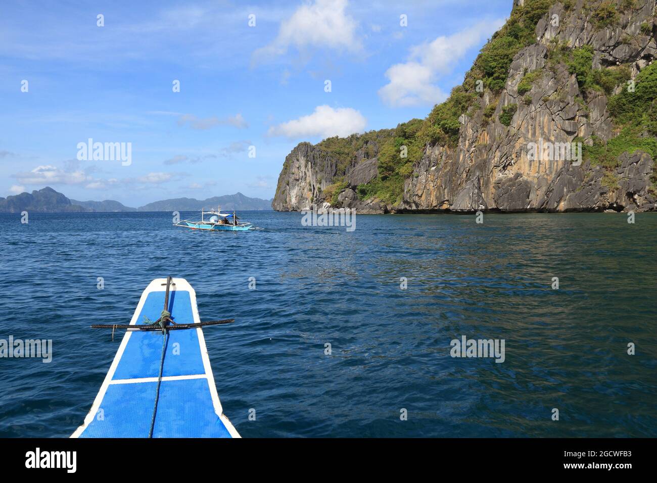 Onboard traditional bangka boat in Philippines island hopping tour ...
