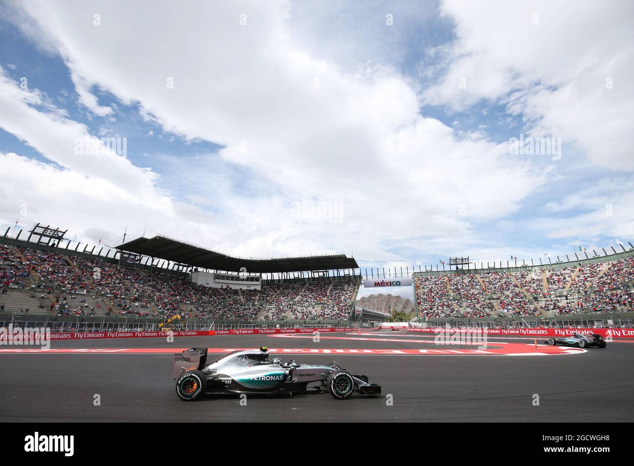 Nico Rosberg (GER) Mercedes AMG F1 W06 with his rear brakes on fire ...