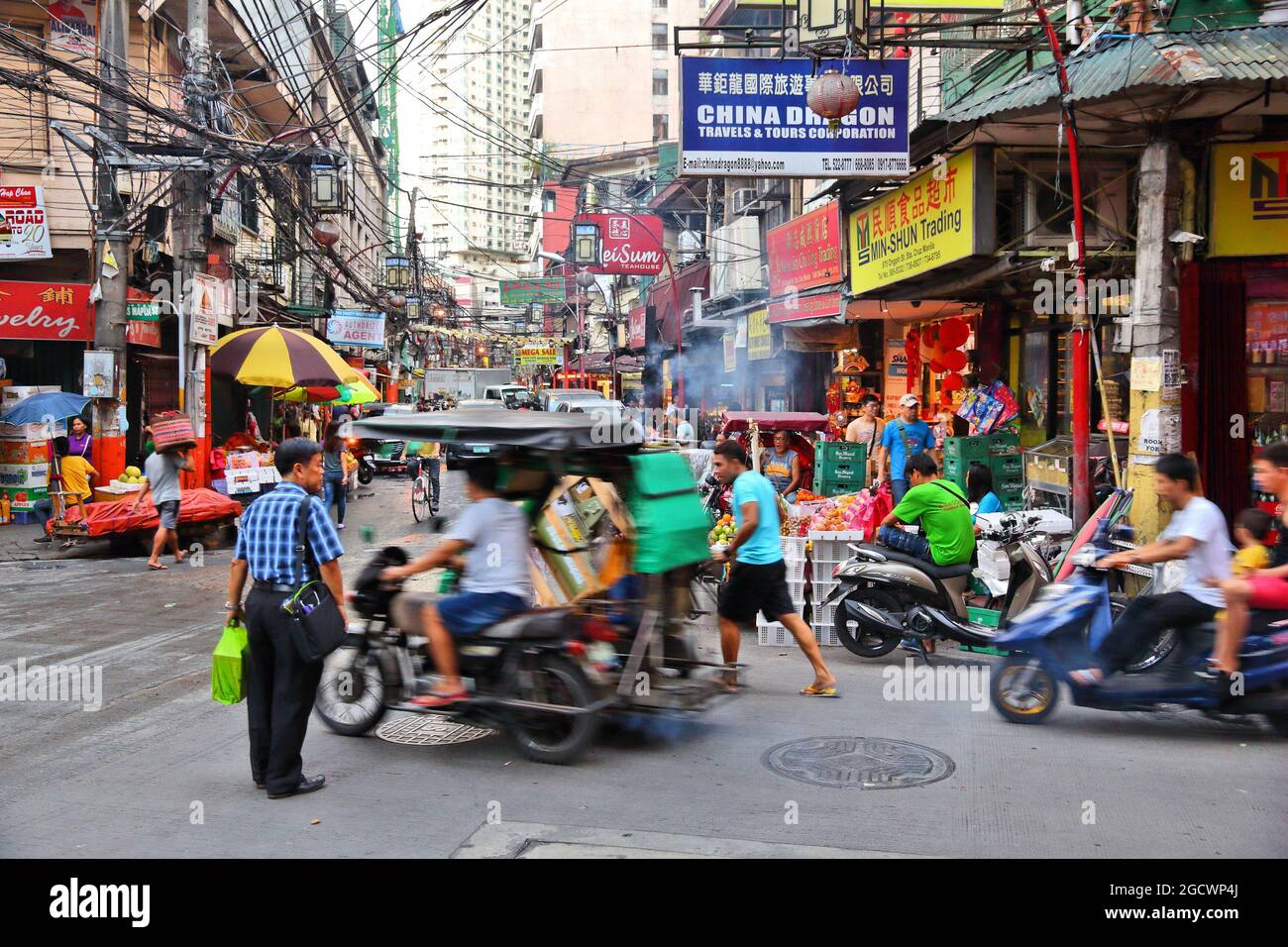 MANILA, PHILIPPINES - NOVEMBER 25, 2017: People visit Chinatown in ...