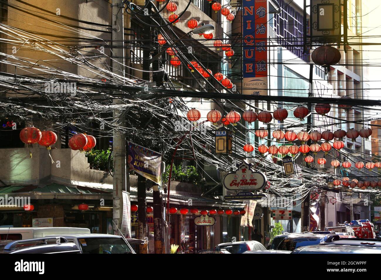 MANILA, PHILIPPINES - NOVEMBER 25, 2017: Tangled cables and chaotic ...