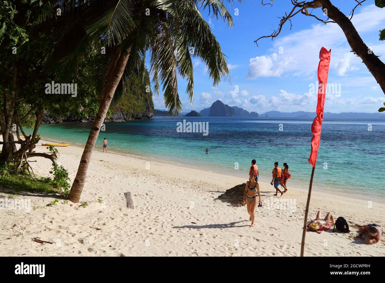 PALAWAN, PHILIPPINES - DECEMBER 1, 2017: People visit Papaya Beach in ...
