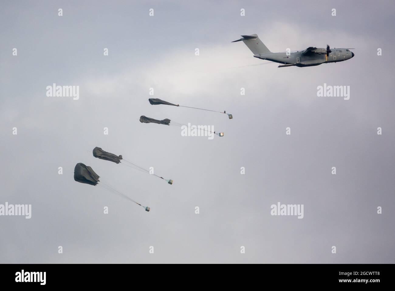 RAF Airbus A400M Atlas on a low level pass dropping pallet supplies by ...