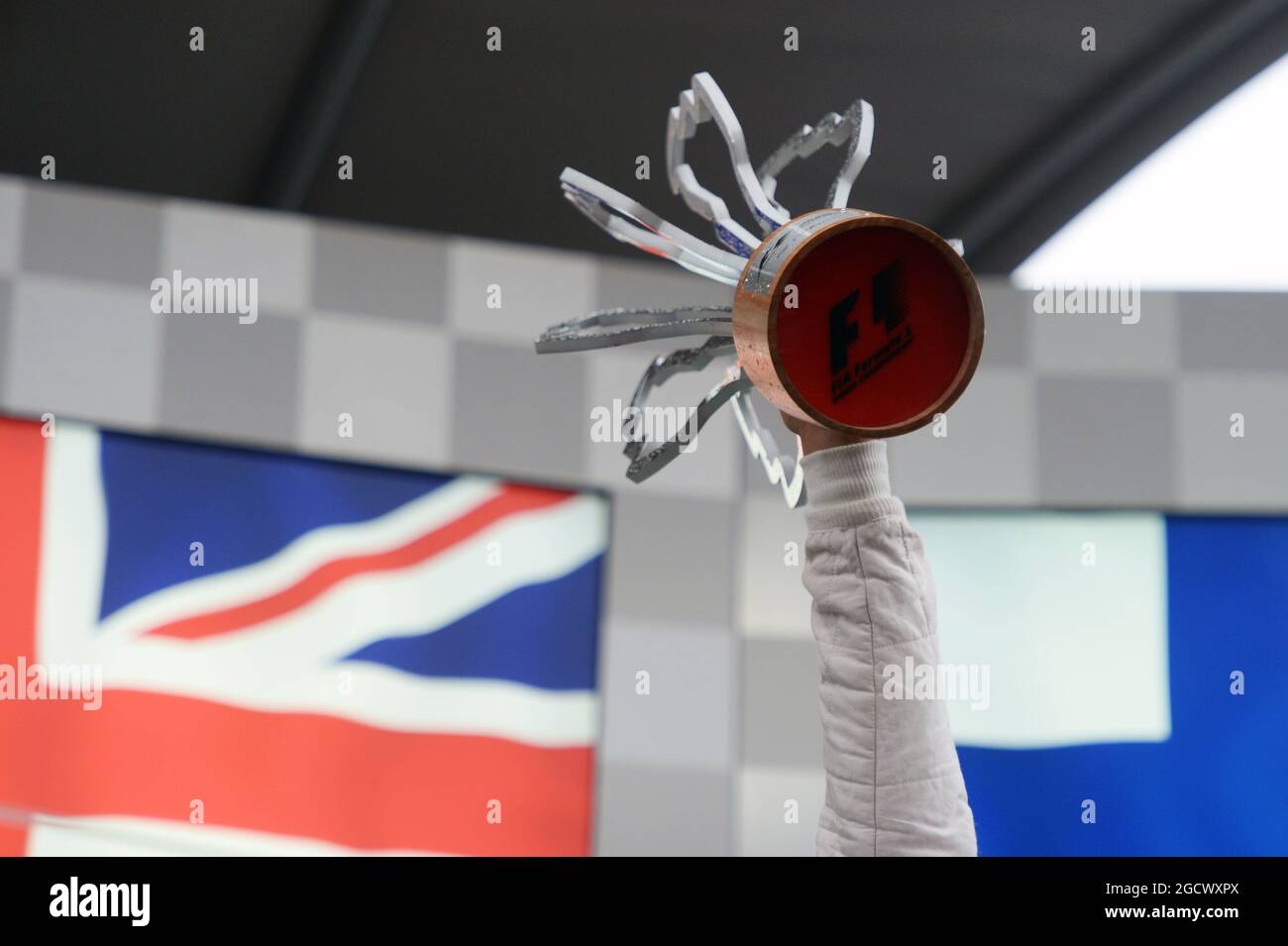 Mercedes amg f1 celebrates his trophy on podium hi-res stock ...