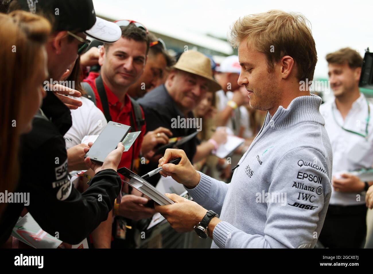 Nico Rosberg (GER) Mercedes AMG F1 signs autographs for the fans ...