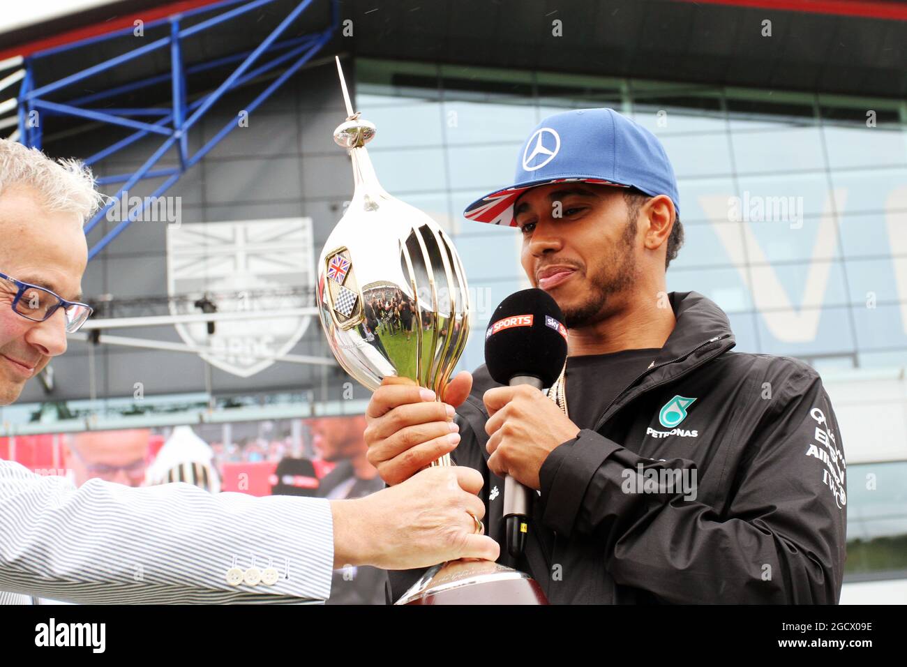 Lewis Hamilton (GBR) Mercedes AMG F1 is presented with the Hawthorn ...