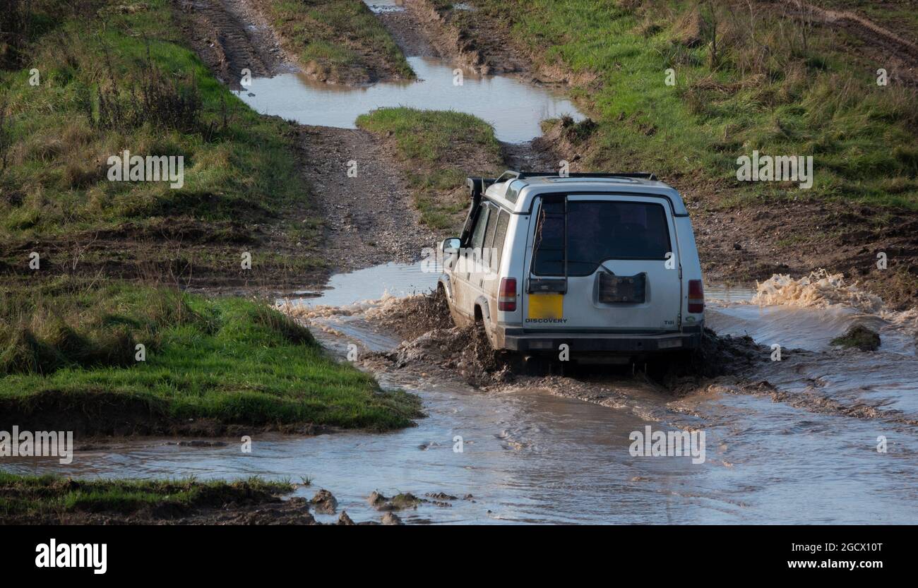4x4 land rover discovery series II off roading, wading in deep water ...