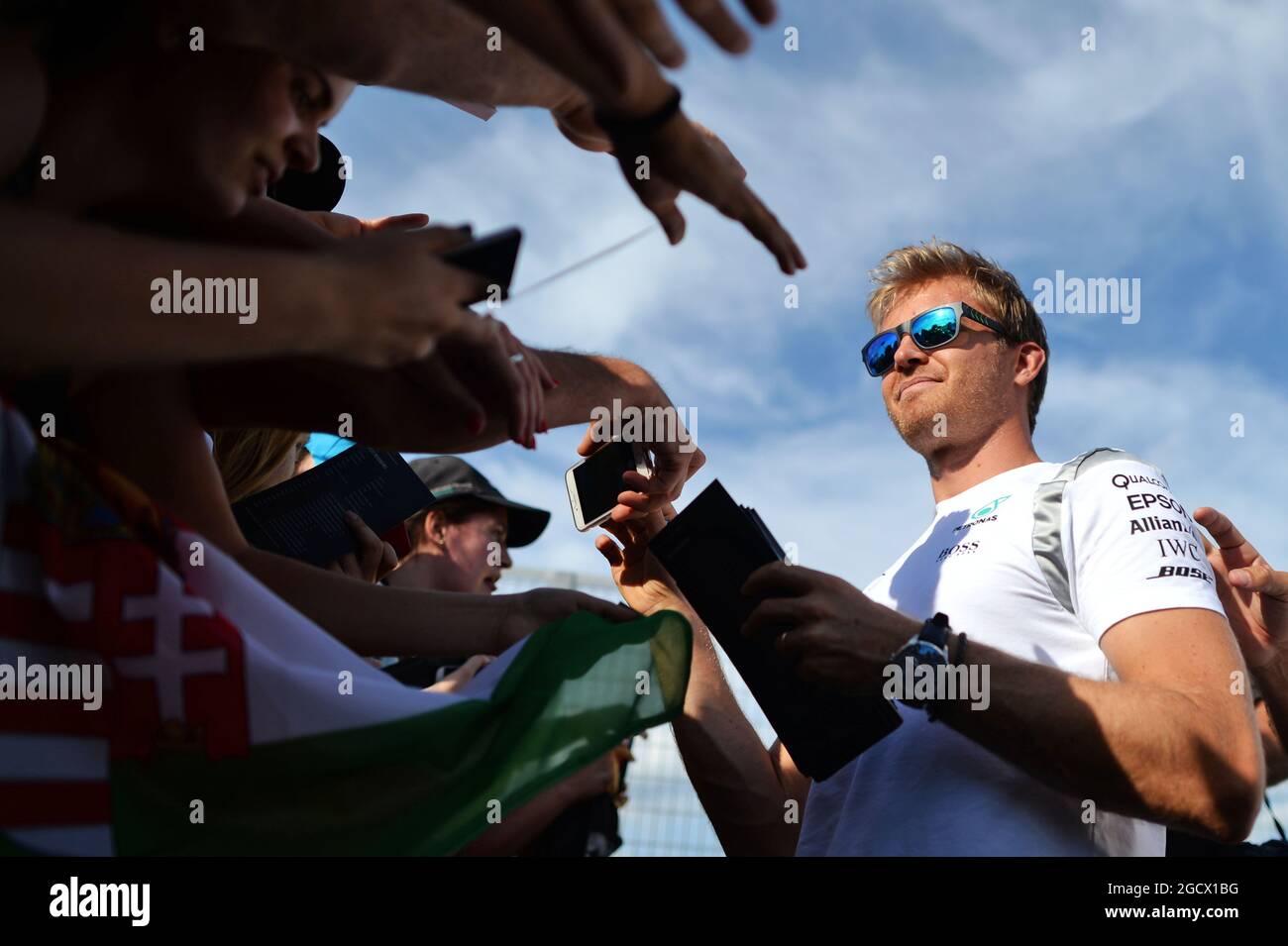 Nico Rosberg (GER) Mercedes AMG F1 signs autographs for the fans ...