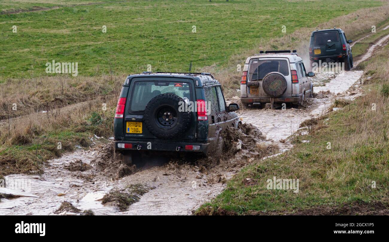 4x4 land rover discovery series II off roading in deep slippery mud ...