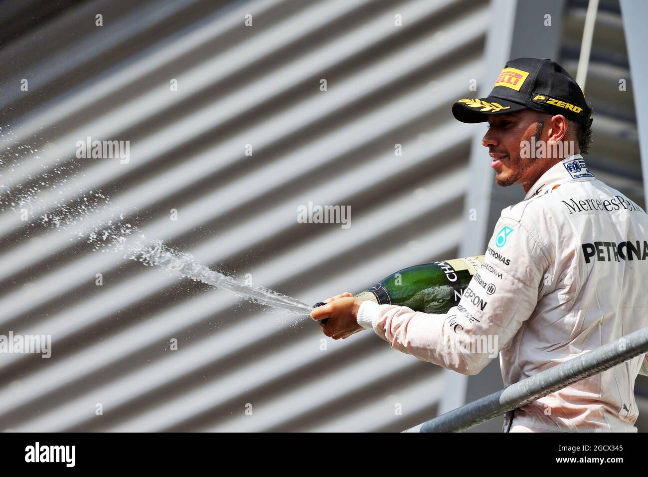 Mercedes amg f1 celebrates his third position champagne on podium hi ...