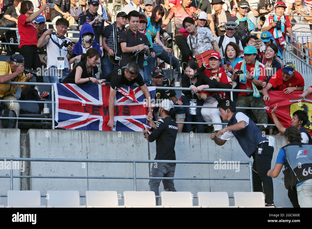 Mercedes amg f1 signs autographs for fans in grandstand hi-res stock ...