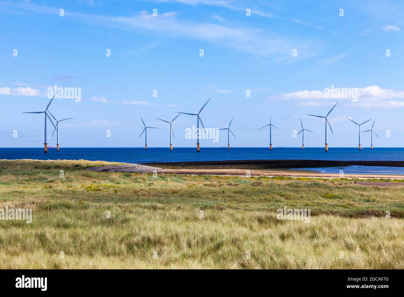 The seafront at South Gare with the offshore wind turbines at Redcar ...