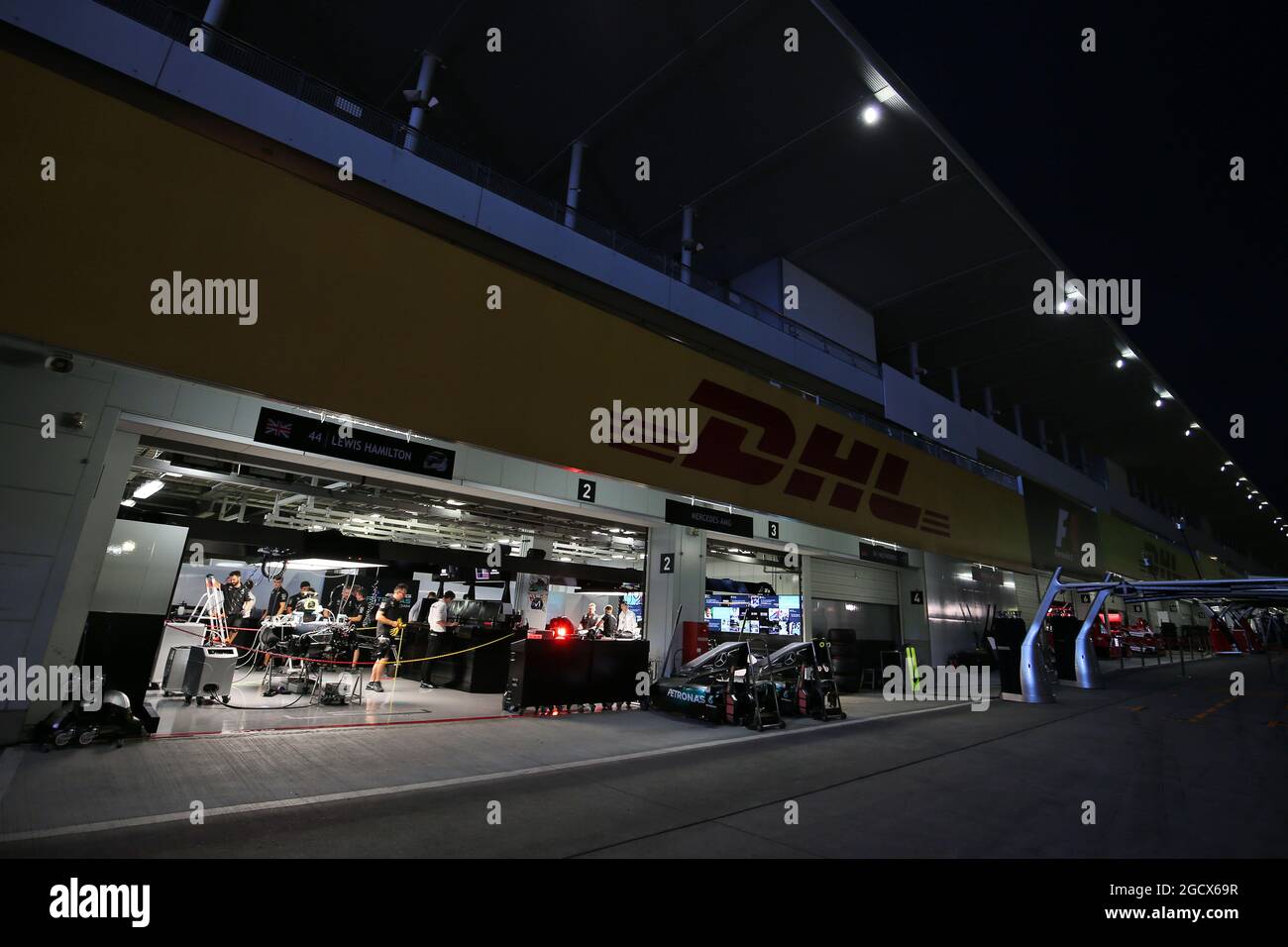 Mercedes amg f1 pit garages at night hi-res stock photography and ...