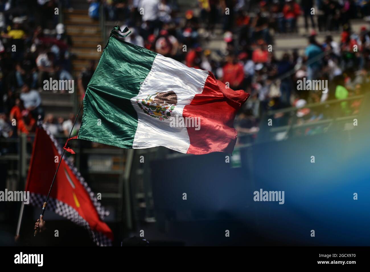 A mecican flag waved by fans hi-res stock photography and images - Alamy