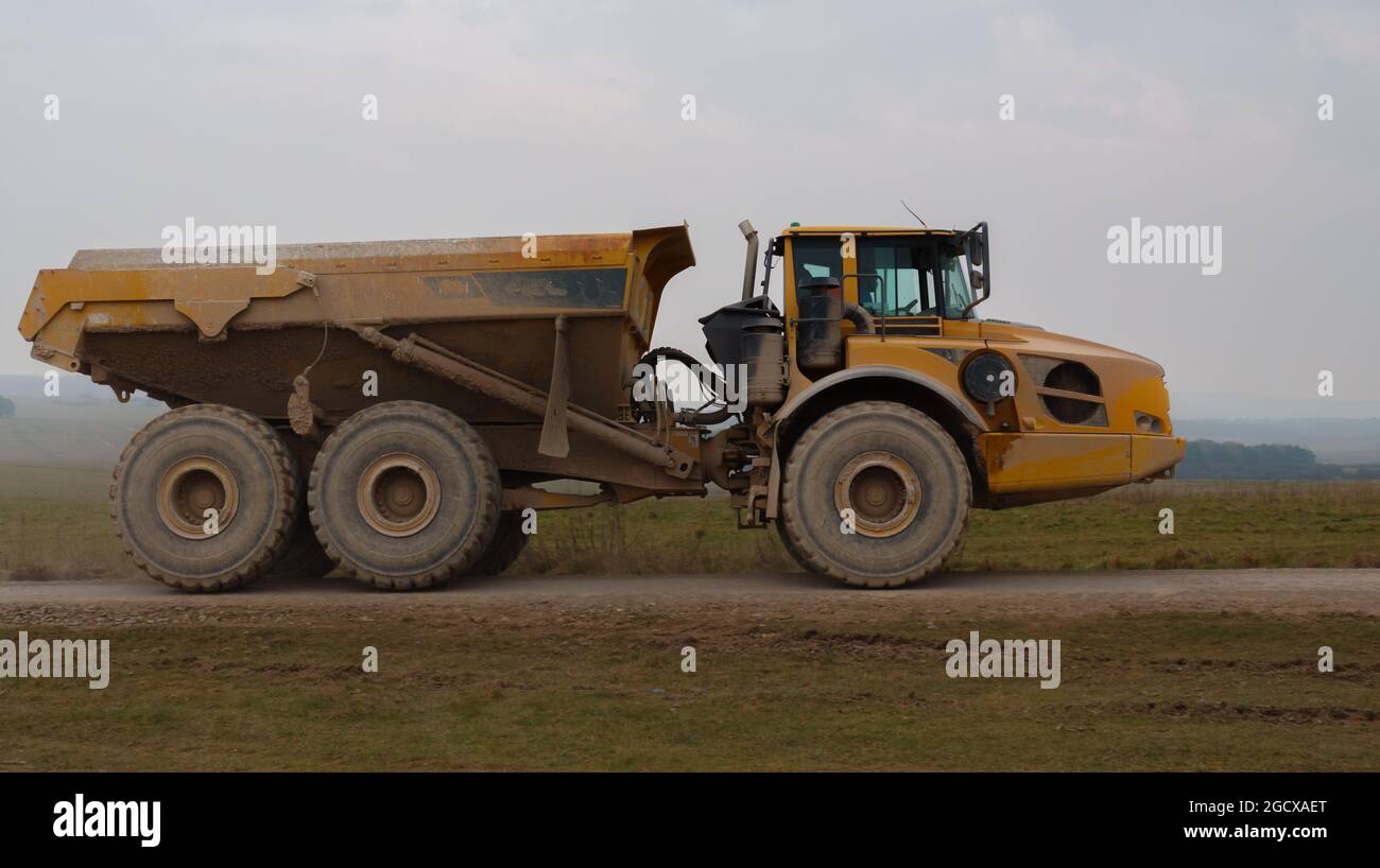 yellow Volvo A40E, A40F articulated dump truck earth mover with 25 ...