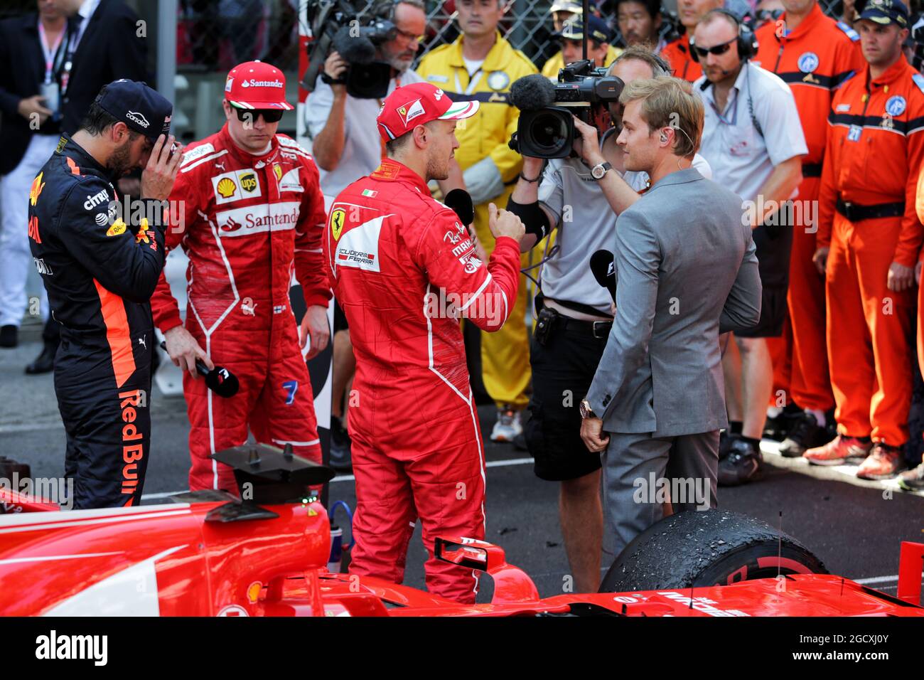 Nico Rosberg (GER) with race winner Sebastian Vettel (GER) Ferrari ...